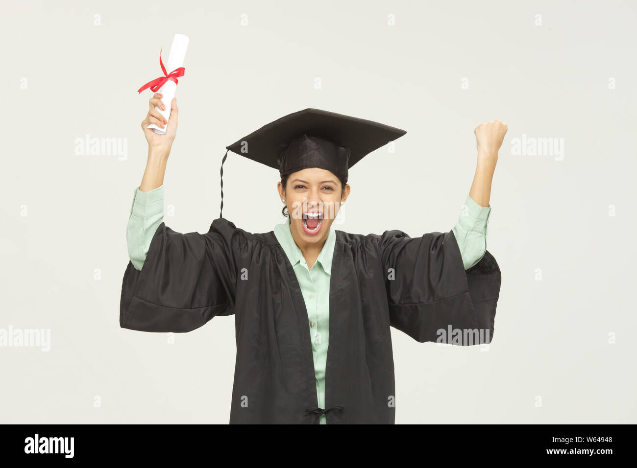 University student celebrating graduation Stock Photo - Alamy