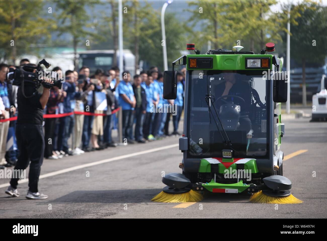 An autonomous driving sanitation vehicle co-developed by Baidu's ...