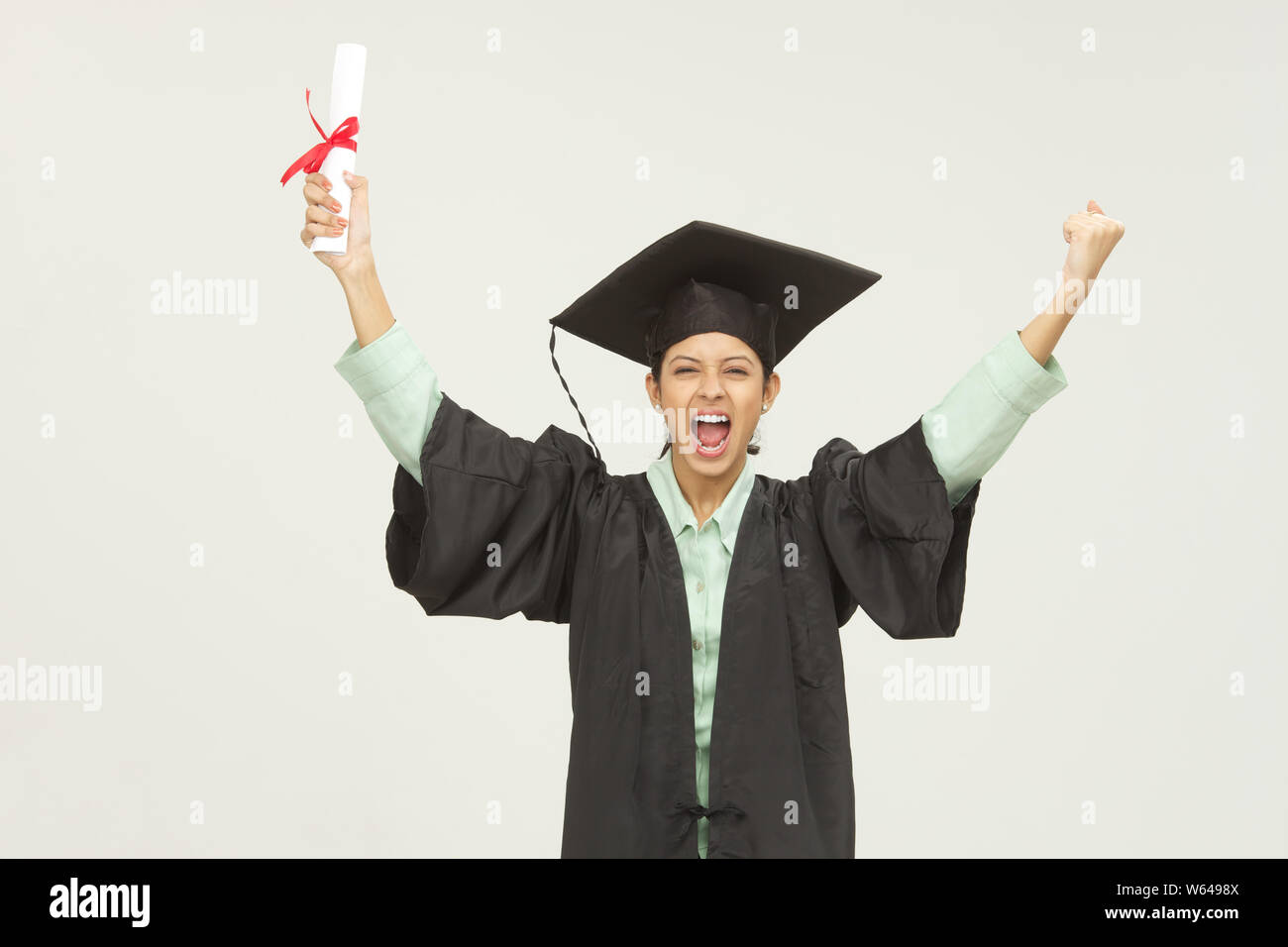 University student celebrating graduation Stock Photo - Alamy