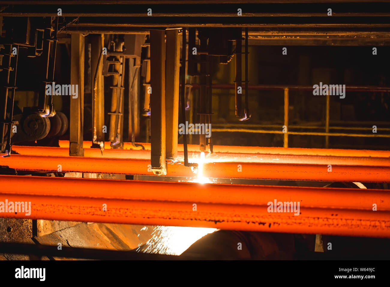 Steel Billets at Torch Cutting. Metallurgical plant Stock Photo - Alamy