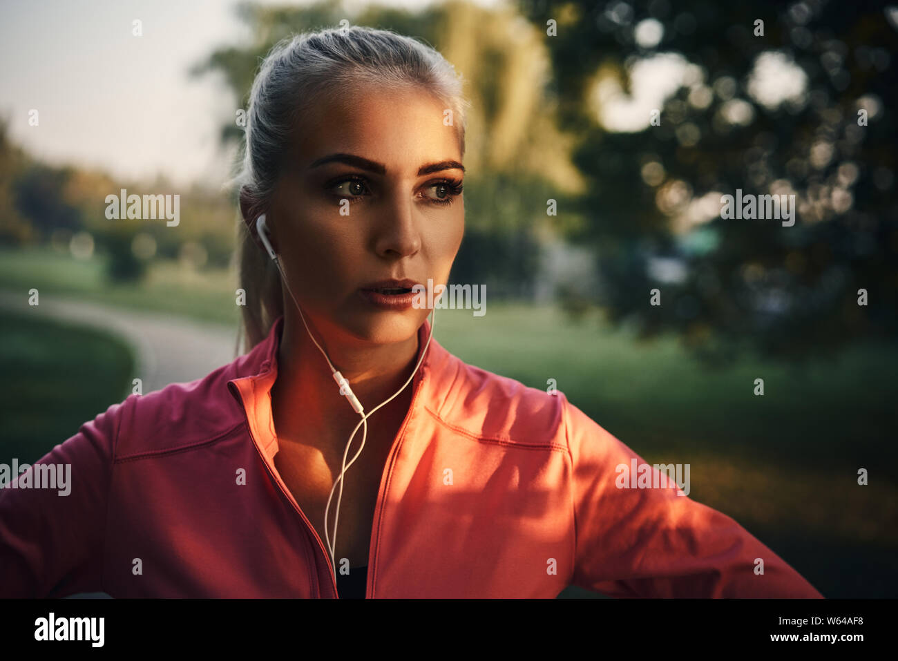 Serious female runner in hi-res stock photography and images - Alamy