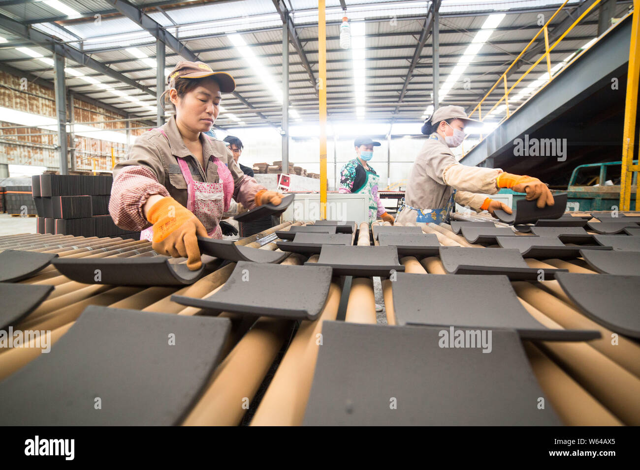 Ceramic tiles manufacturing hi-res stock photography and images - Alamy