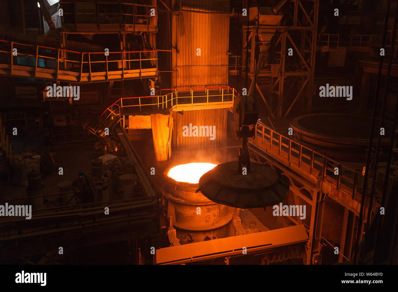 Melting of metal in a steel plant. High temperature in the melting ...