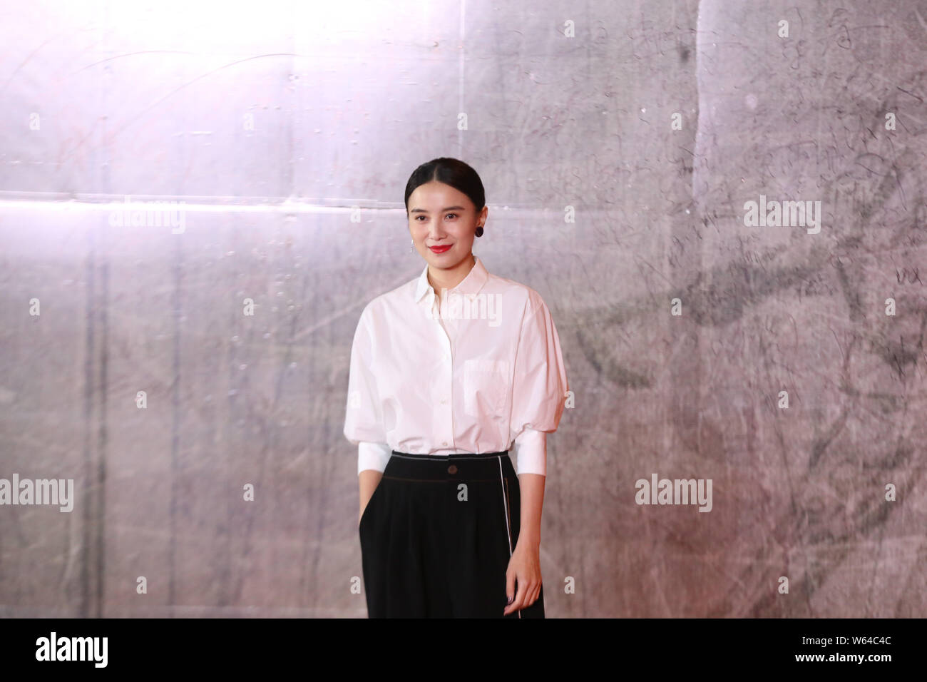 Chinese actress Song Jia, also known as Xiao Song Jia, poses as she arrives on the red carpet ...