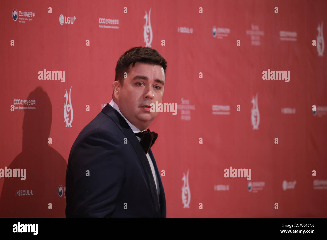 New Zealand-born Australian comedian Sam Hammington arrives on the red ...