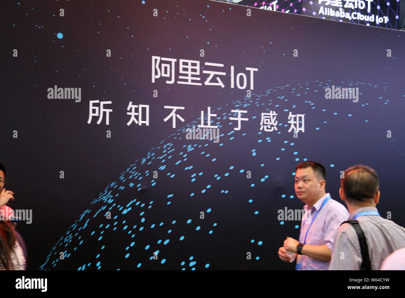 --FILE--People visit the stand of Aliyun.com or AliCloud, the online ...