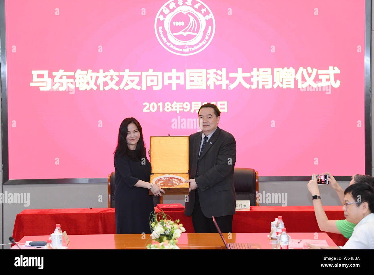 Melissa Ma, left, wife of and special assistant to Baidu Chief ...