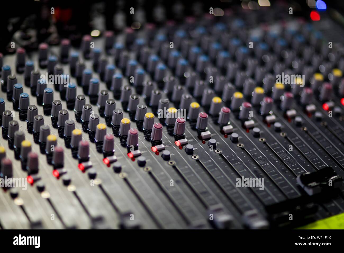 Mixer desk in details, buttons and sliders Stock Photo - Alamy