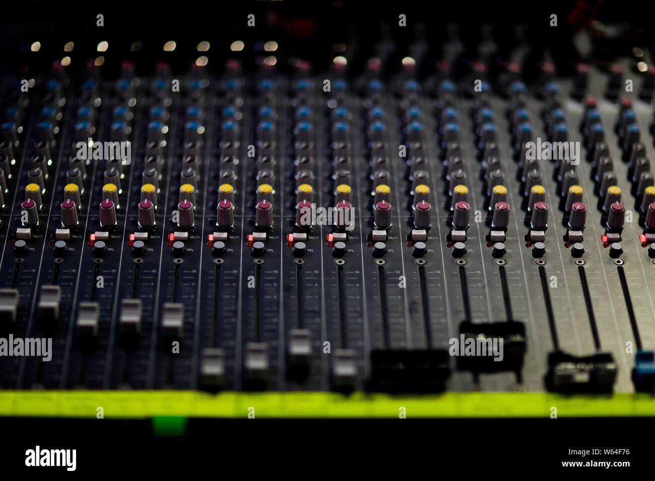 Front view on mixer desk in details, buttons and sliders Stock Photo ...