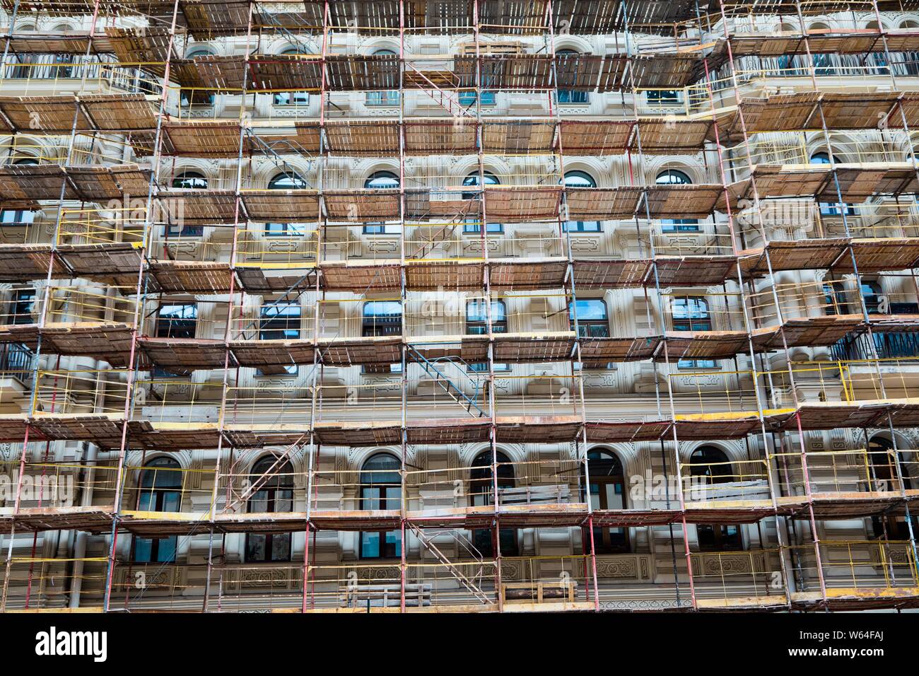 Scaffold on historical building under reconstruction Stock Photo - Alamy