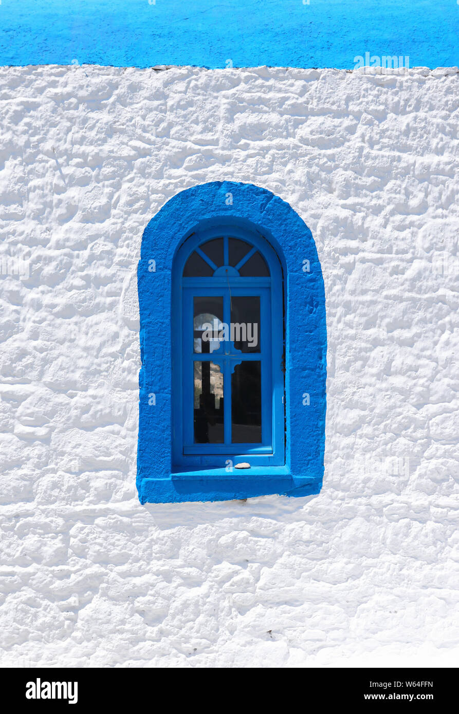 landmark photo of blue window typical Greek bulding Stock Photo - Alamy