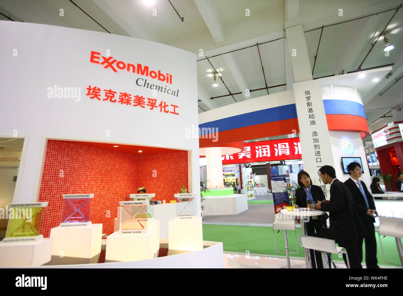 --FILE--People visit the stand of US energy giant ExxonMobil during an ...