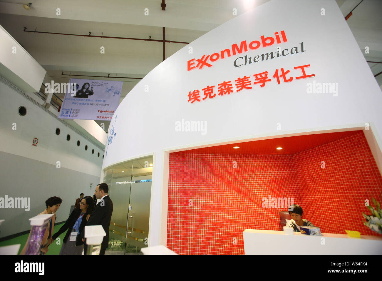 --FILE--People visit the stand of US energy giant ExxonMobil during an ...