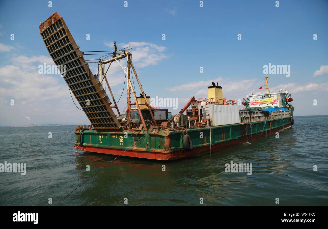 Chinese workers unearth weaponry equipment as well as some tools from ...