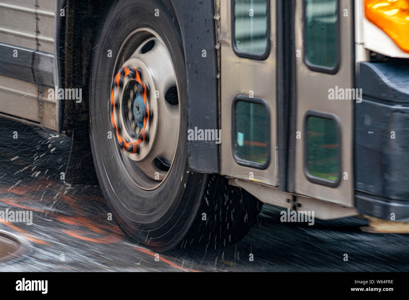 coach bus tire detail while raining in new york city Stock Photo - Alamy
