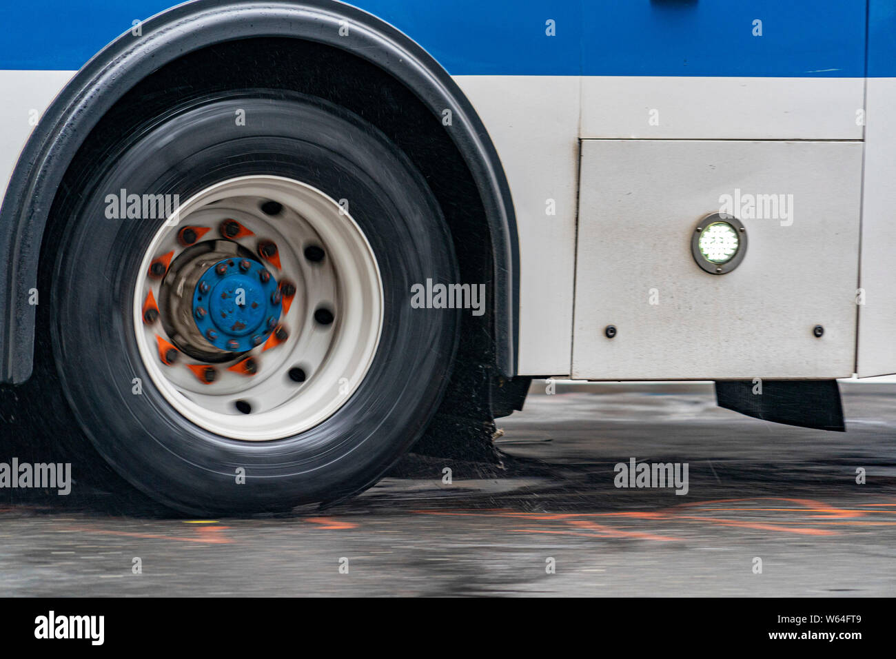 coach bus tire detail while raining in new york city Stock Photo - Alamy