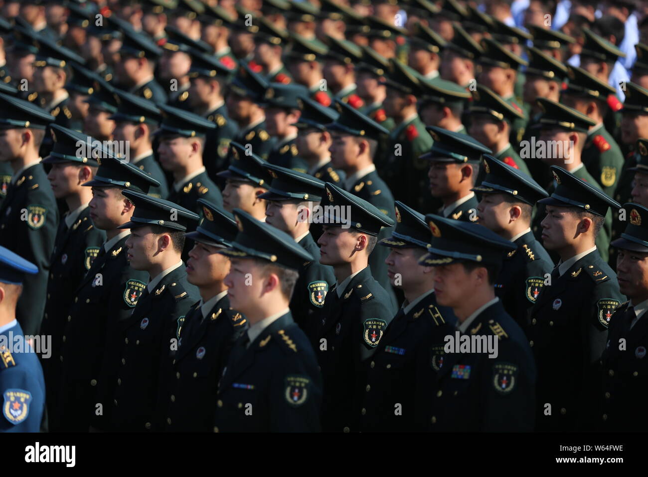 Delegates attend a bell-striking event to commemorate the 87th ...