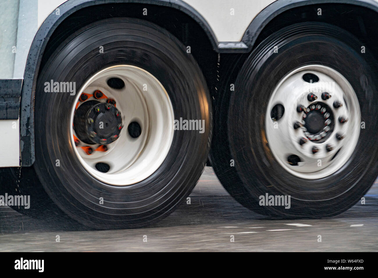 Puddle bus splash hi-res stock photography and images - Alamy