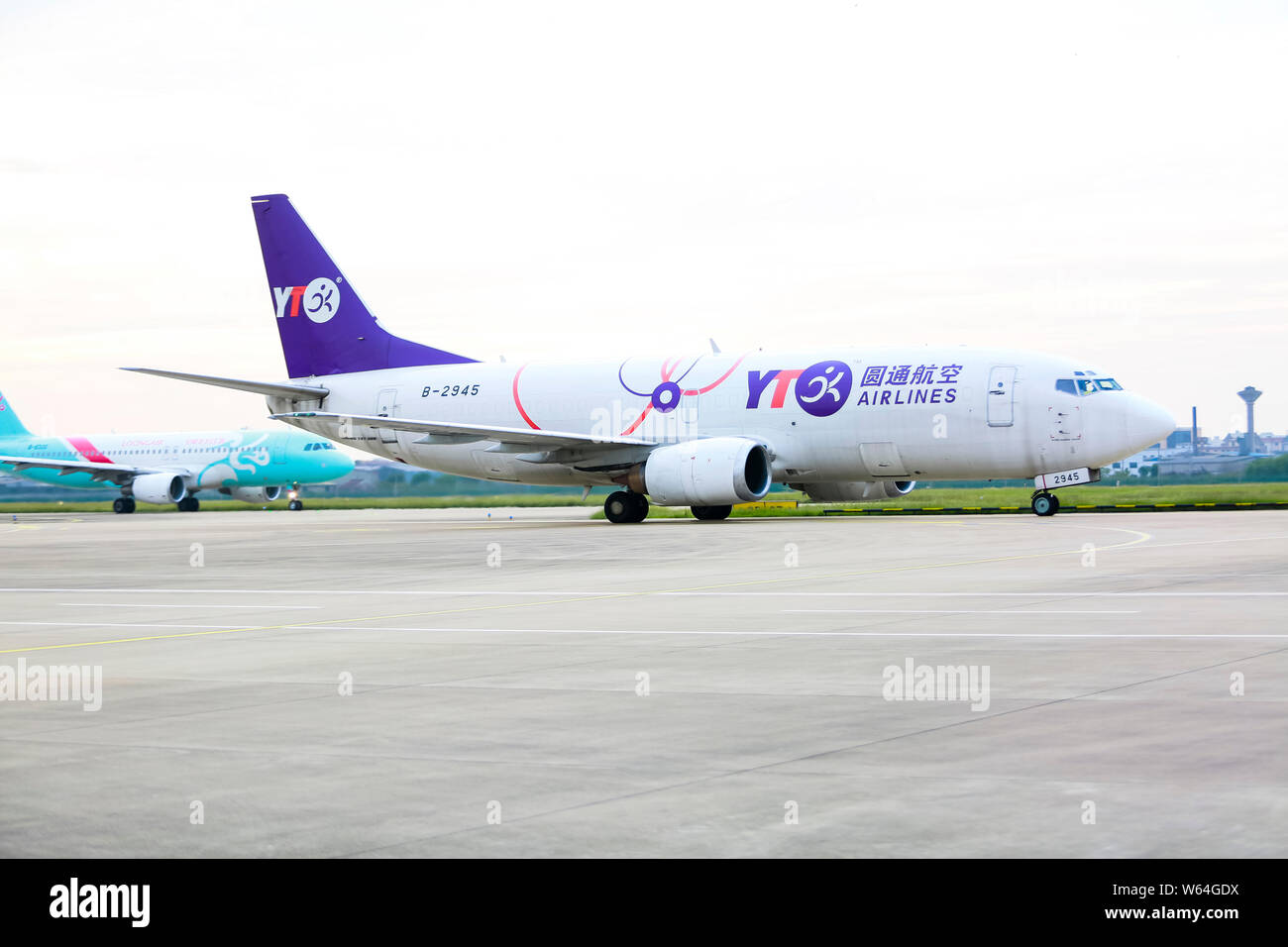 --FILE--A jet plane of YTO Express taxis at an airport in east China's ...