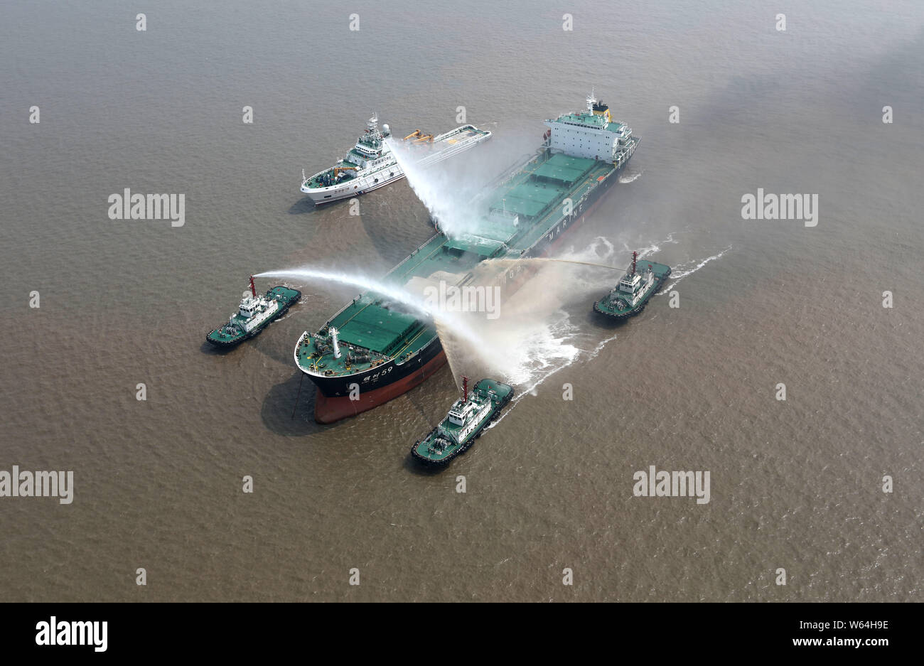 Fireboats fight the fire on an oil tanker a drill for an oil spill ...