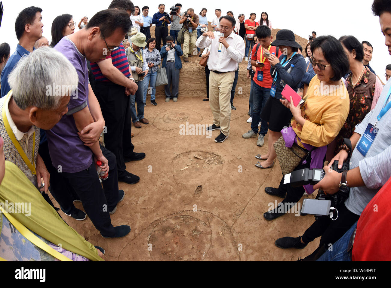 People visit the excavation site of the ruins of Taosi, the 4,200-year ...