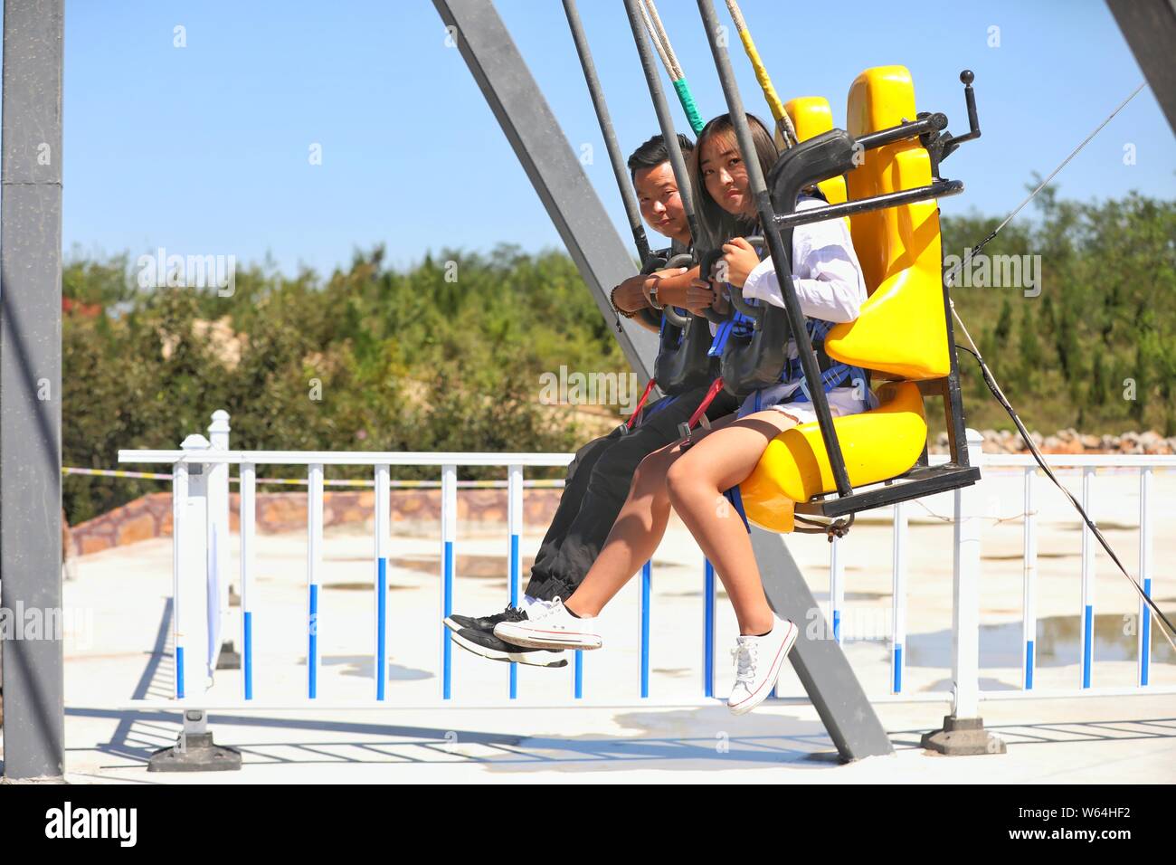 Chinese swings hi-res stock photography and images - Alamy