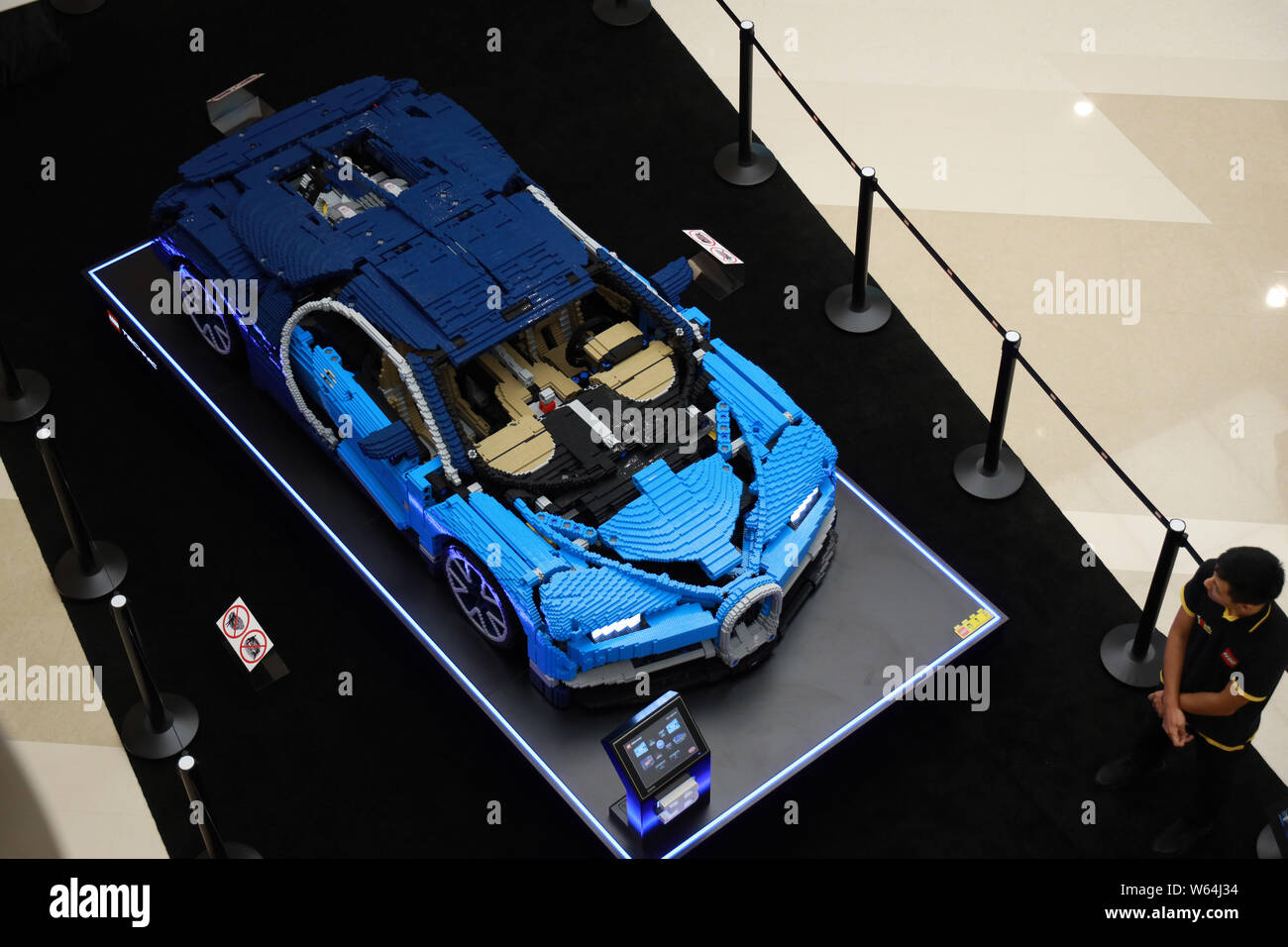 A Bugatti sports car made of 238,762 Lego bricks is on display at a ...