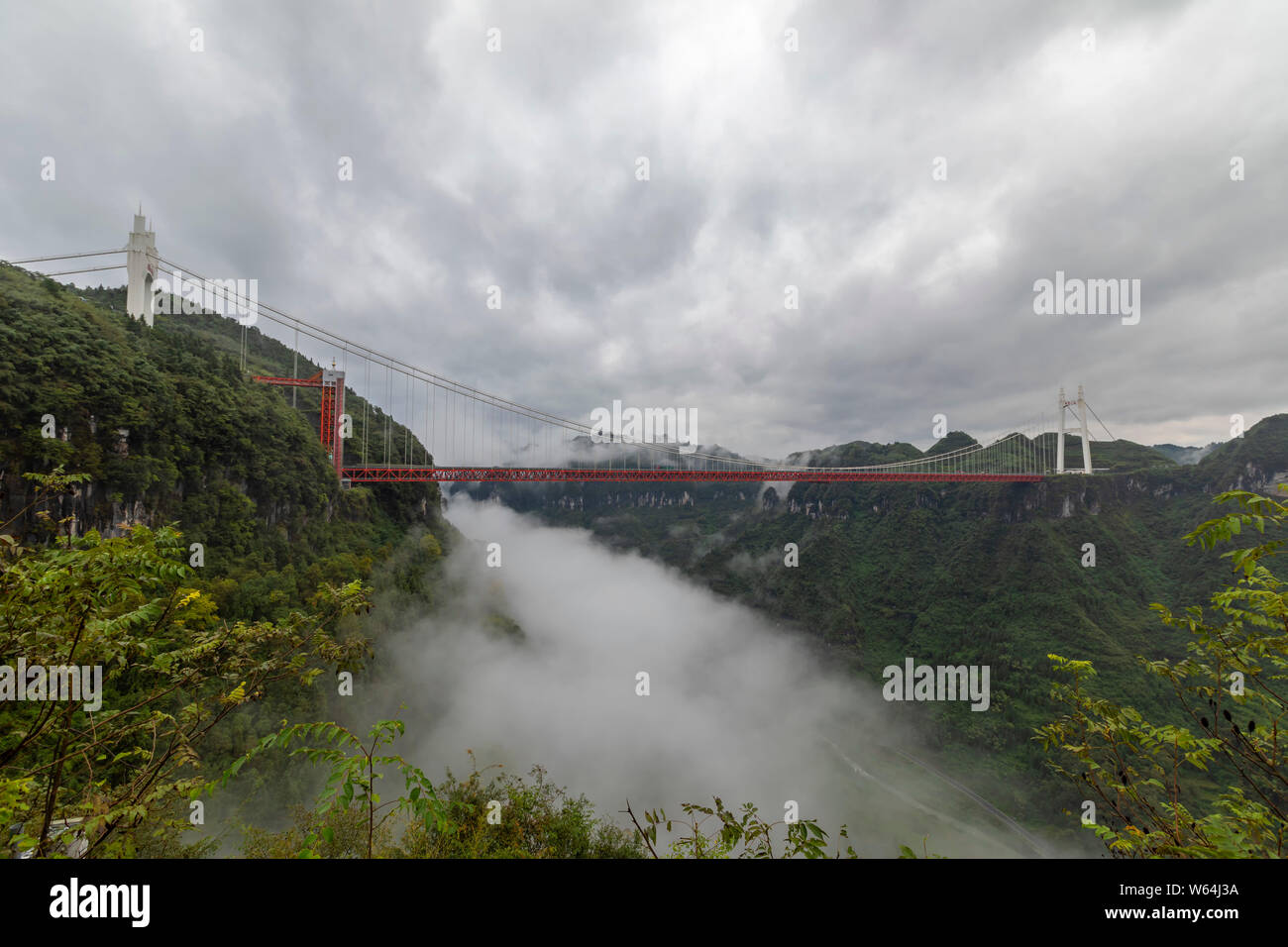 An aerial view of the Aizhai Suspension Bridge, with a main span of ...