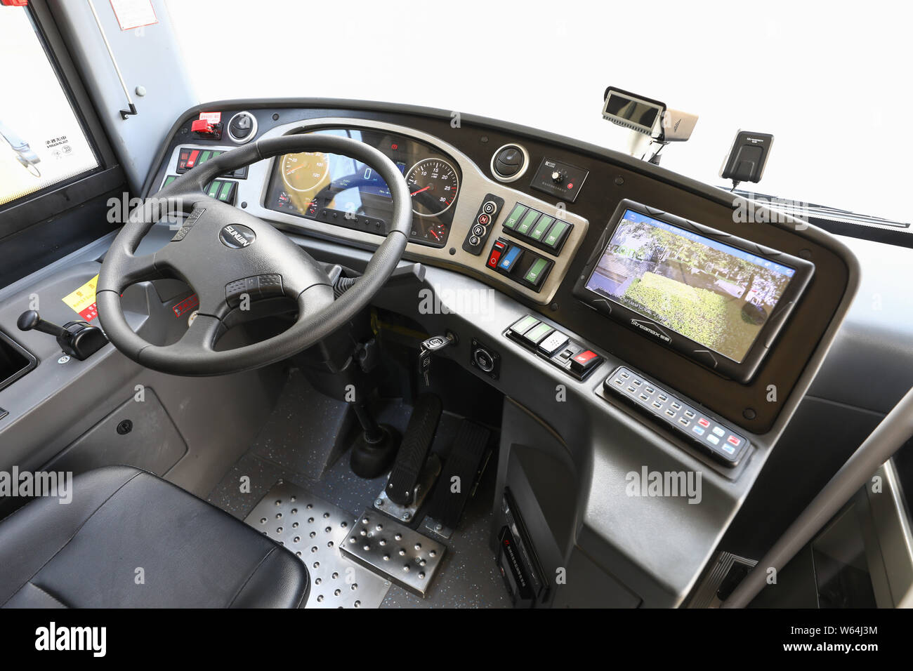 Interior view of a fuel cell-powered bus at a hydrogen filling station ...