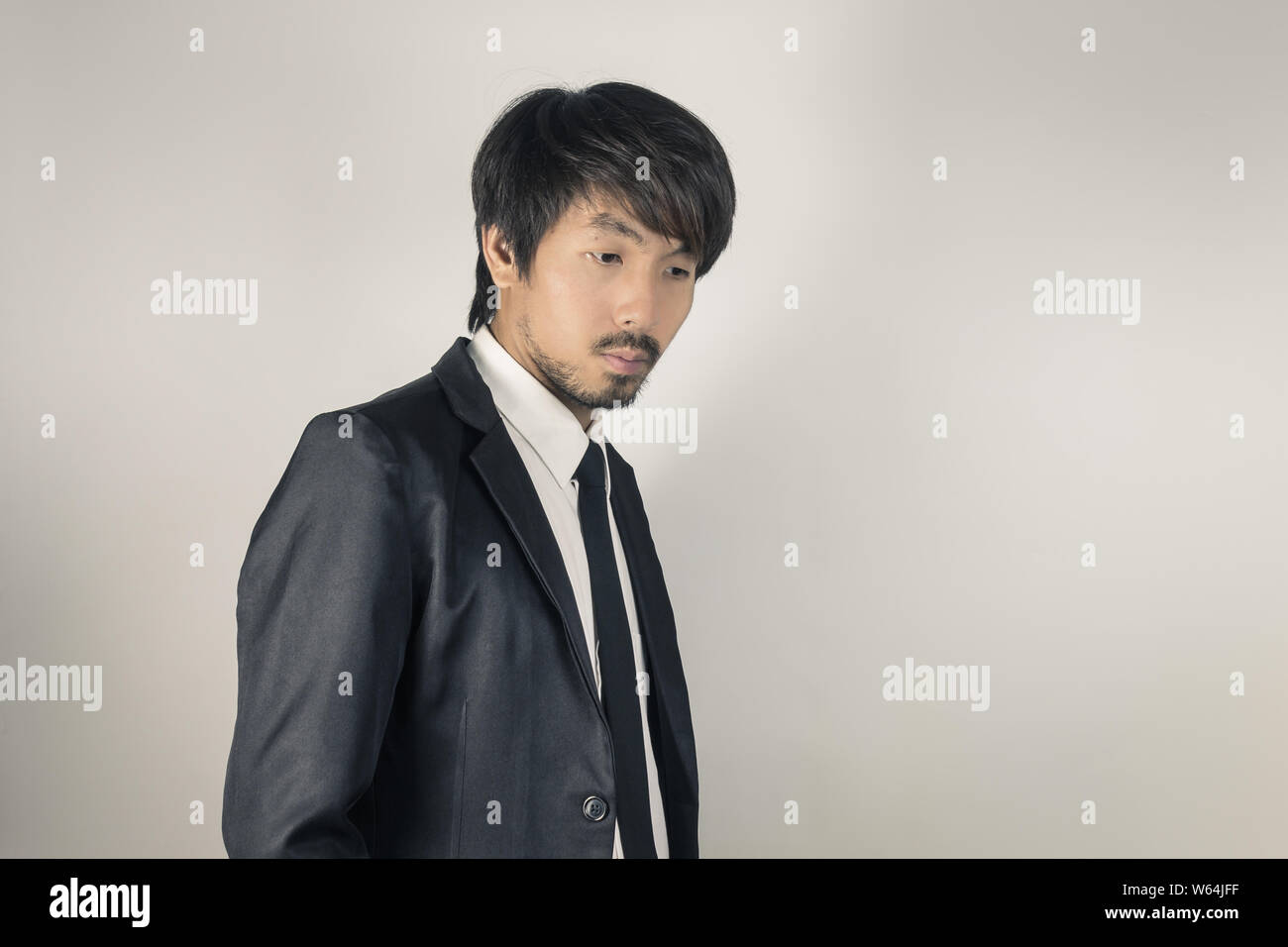 Portrait Businessman in Black Suit Fashion in Side View. Portrait ...