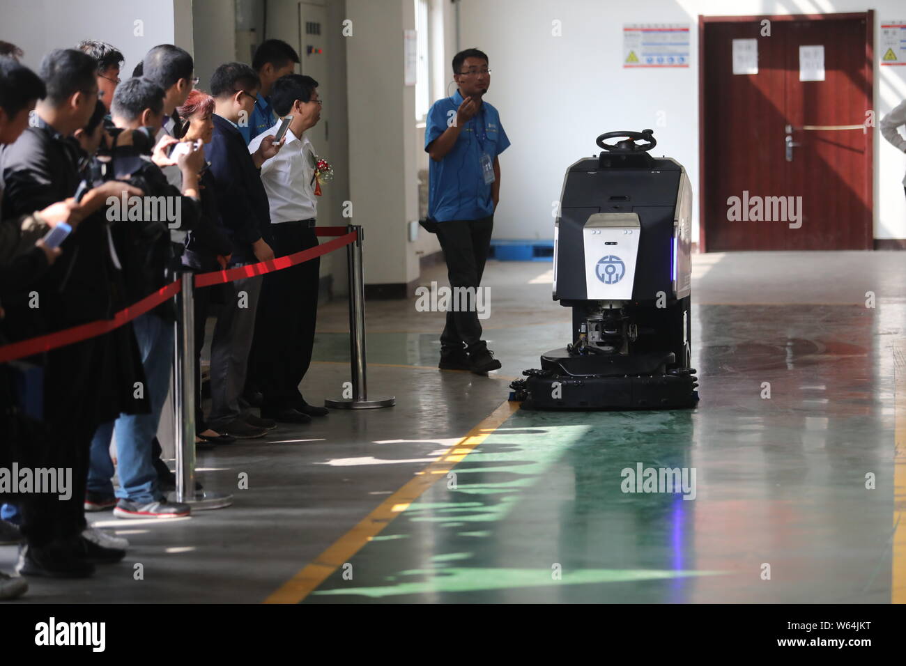 An autonomous driving sanitation vehicle co-developed by Baidu's ...