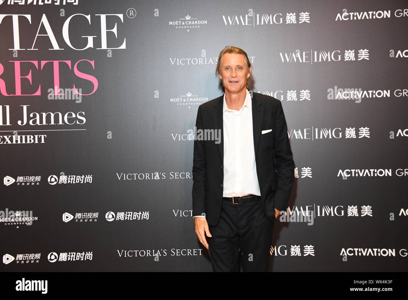 Australia photographer Russell James attends the opening ceremony for ...