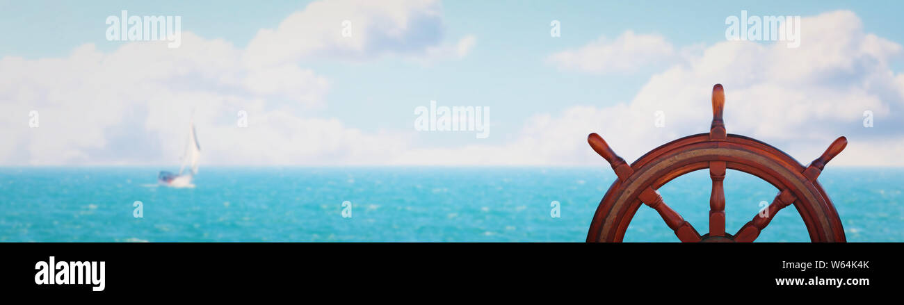 vintage nautical detail of a steering wheel of a ship in front of the ...