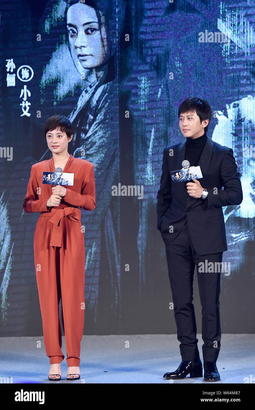 Chinese actress Sun Li, left, and her actor husband Deng Chao attend a ...