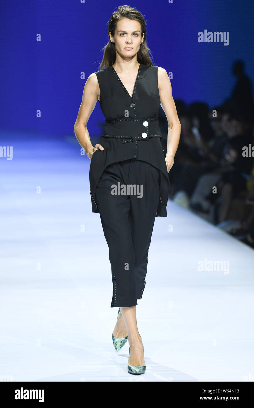 A model displays a new creation at the BIFU fashion show during the ...