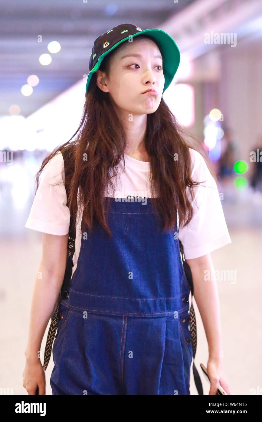 Chinese actress Ni Ni arrives at the Shanghai Hongqiao International ...