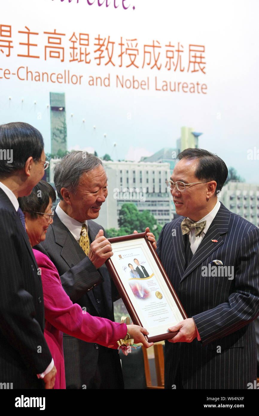 --FILE--Charles K. Kao, center, the winner of the 2009 Nobel Prize in ... --FILE--Charles K. Kao, center, the winner of the 2009 Nobel Prize in ...