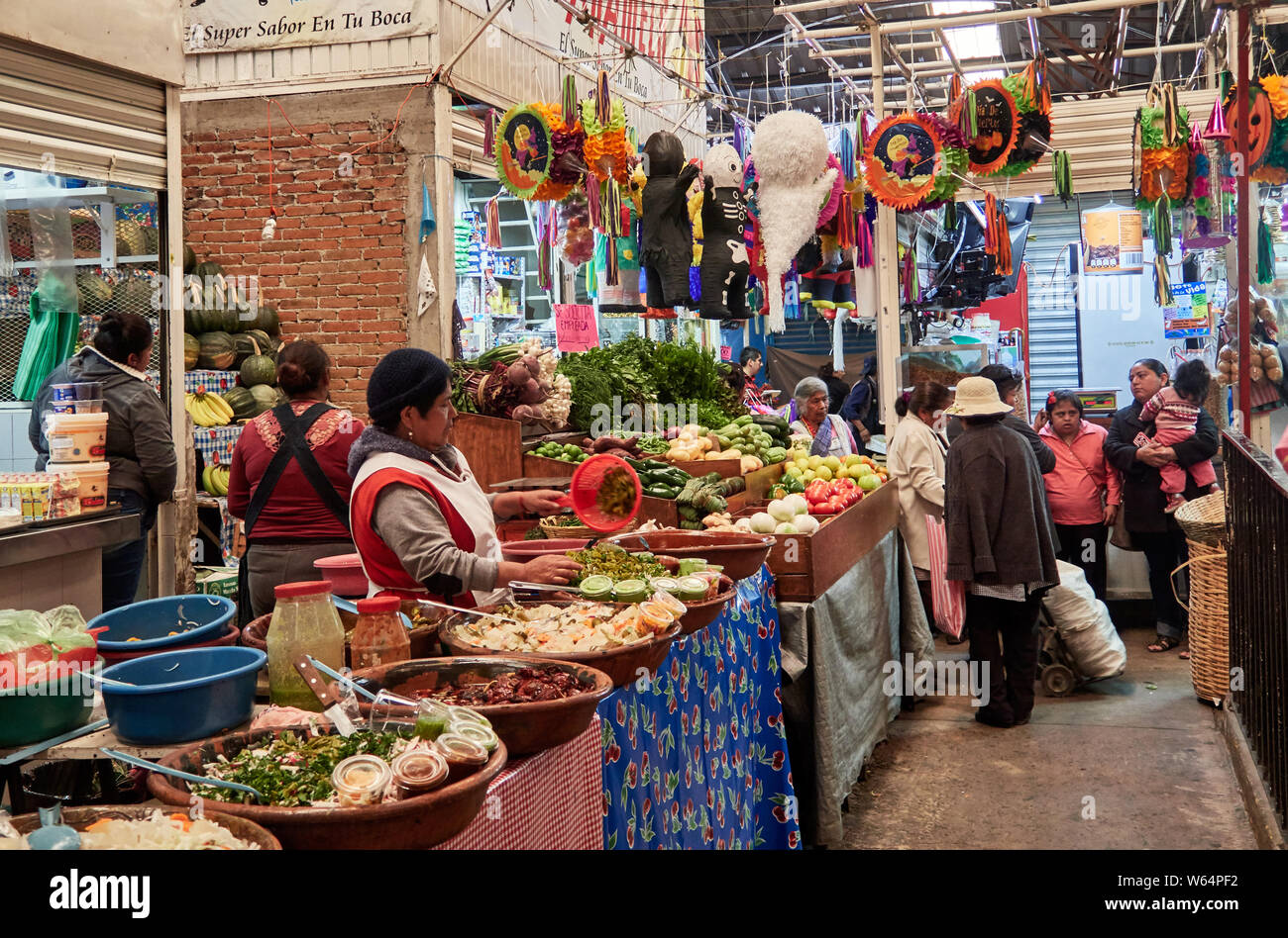 Mexico, San Andreas Cholula, Mexican woman preparing food in the ...