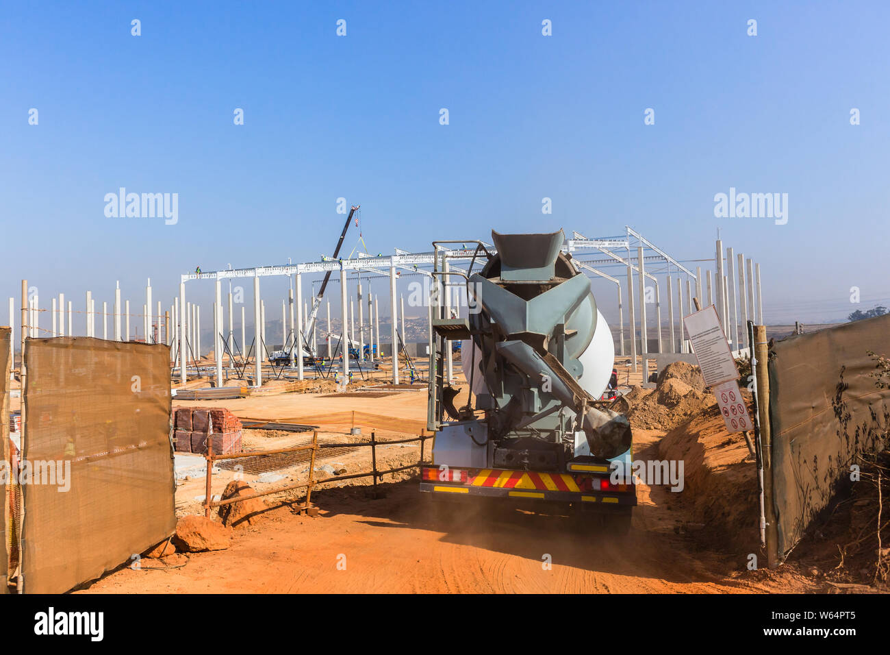 Industrial construction cement concrete truck enters site of new ...