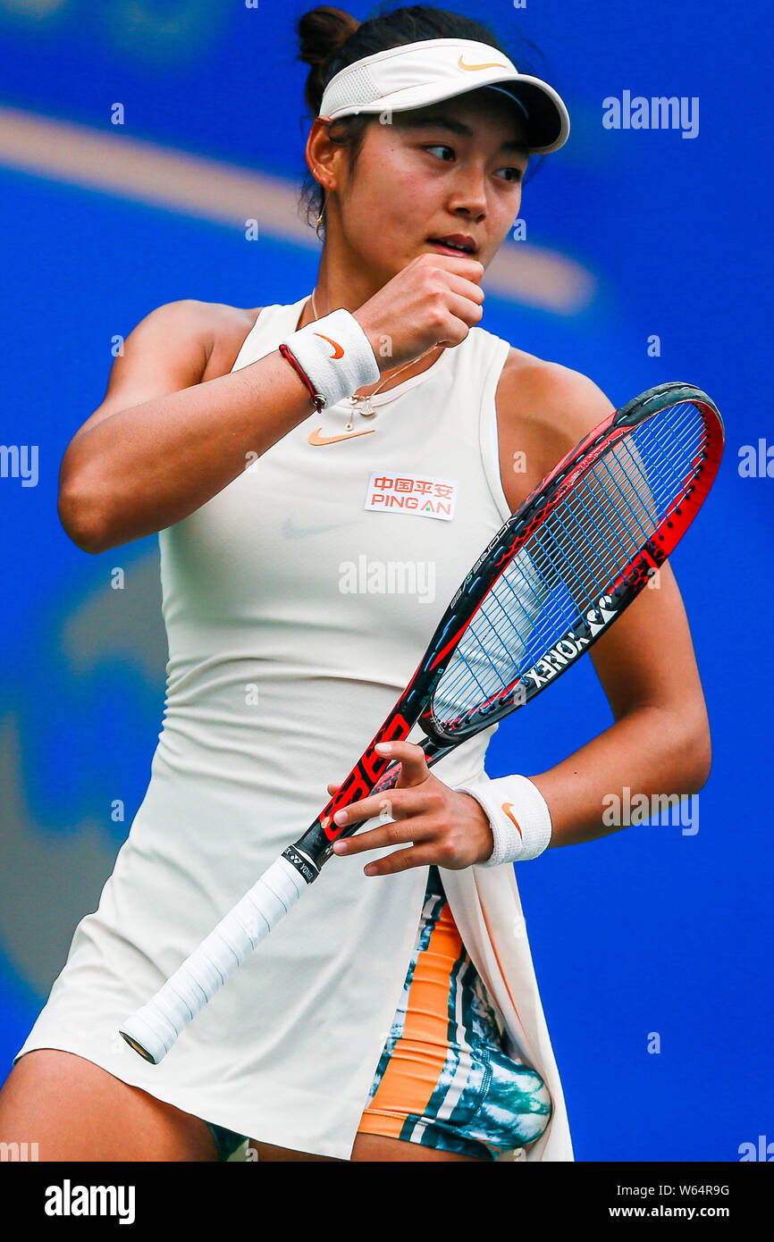 Wang Yafan of China celebrates after scoring against Amanda Anisimova ...