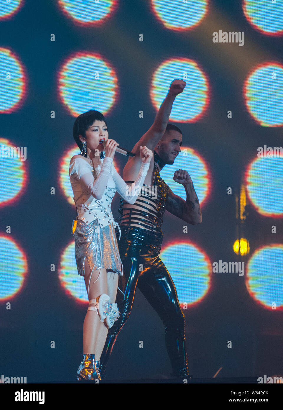 Taiwanese singer and actress Angela Chang, left, performs during her ...