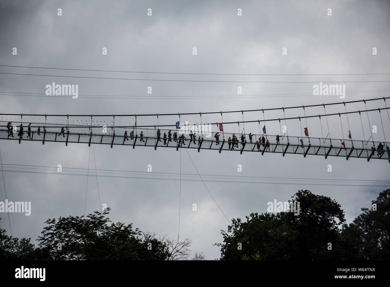 An aerial view of the 5D glass-bottom bridge over the Qinglong Valley ...