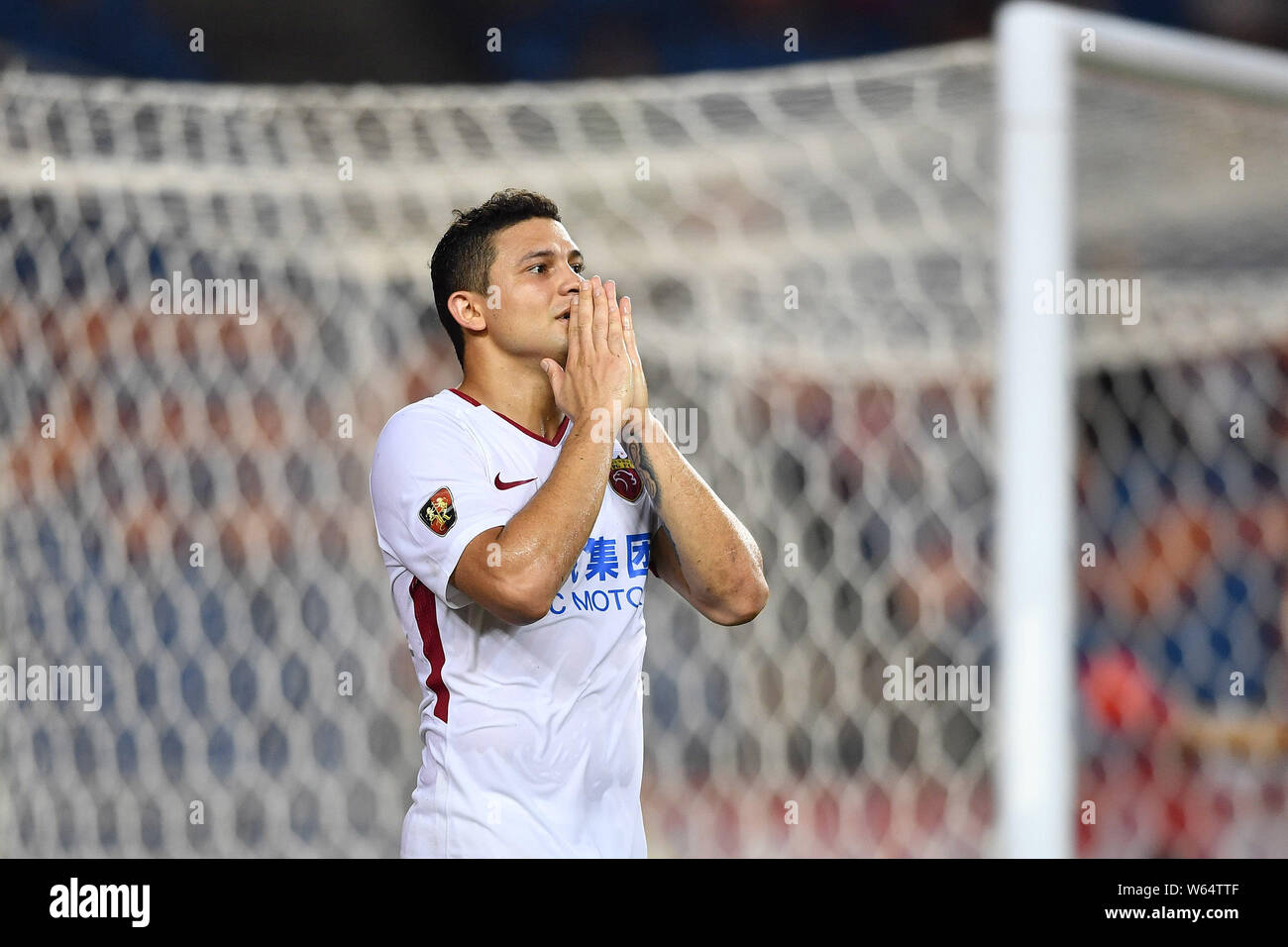 Brazilian football player Elkeson of Shanghai SIPG celebrates after ...