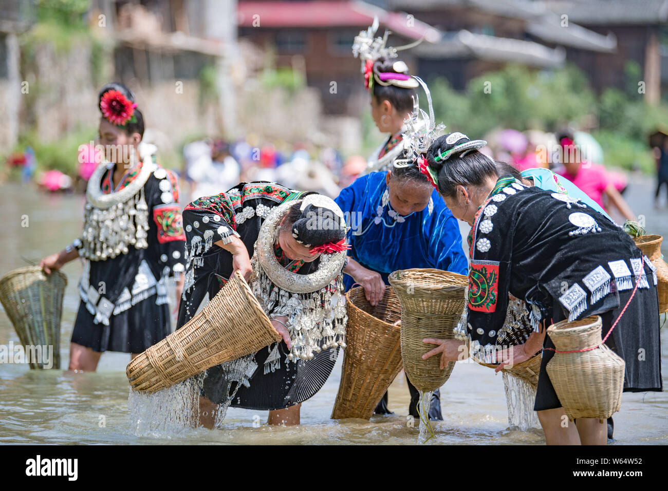 Chinese people of Miao ethnic minority celebrate the fish catching ...