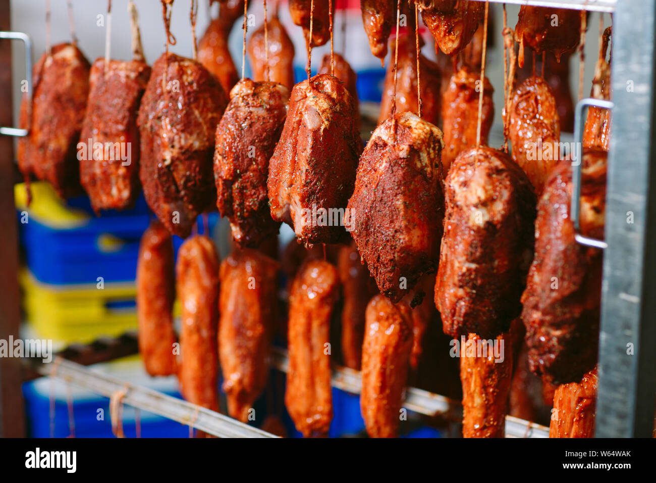 Smoked ham in the oven. Sausage production in the factory Stock Photo ...