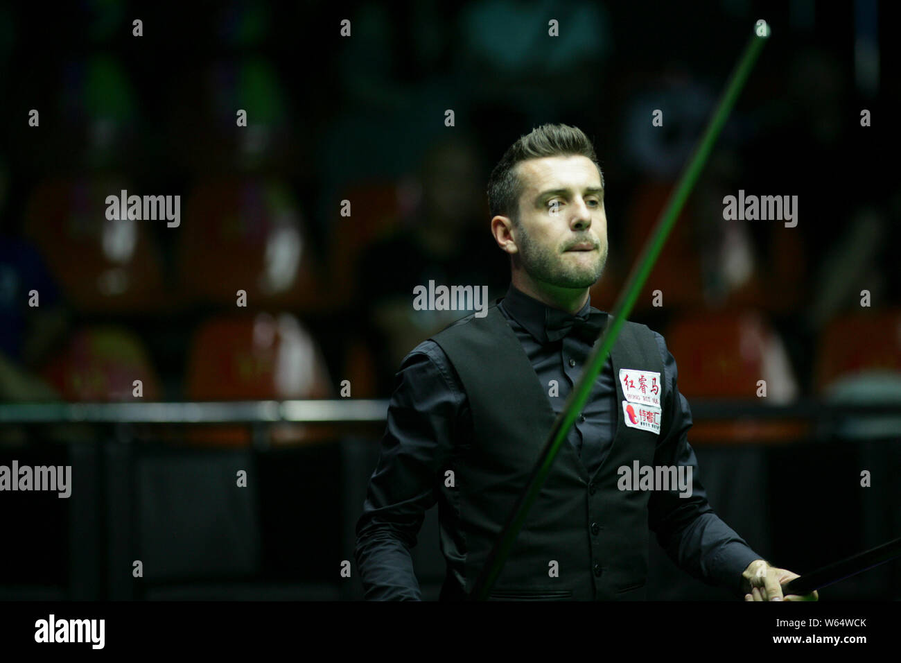 Mark Selby of England considers a shot to Elliot Slessor of England in ...