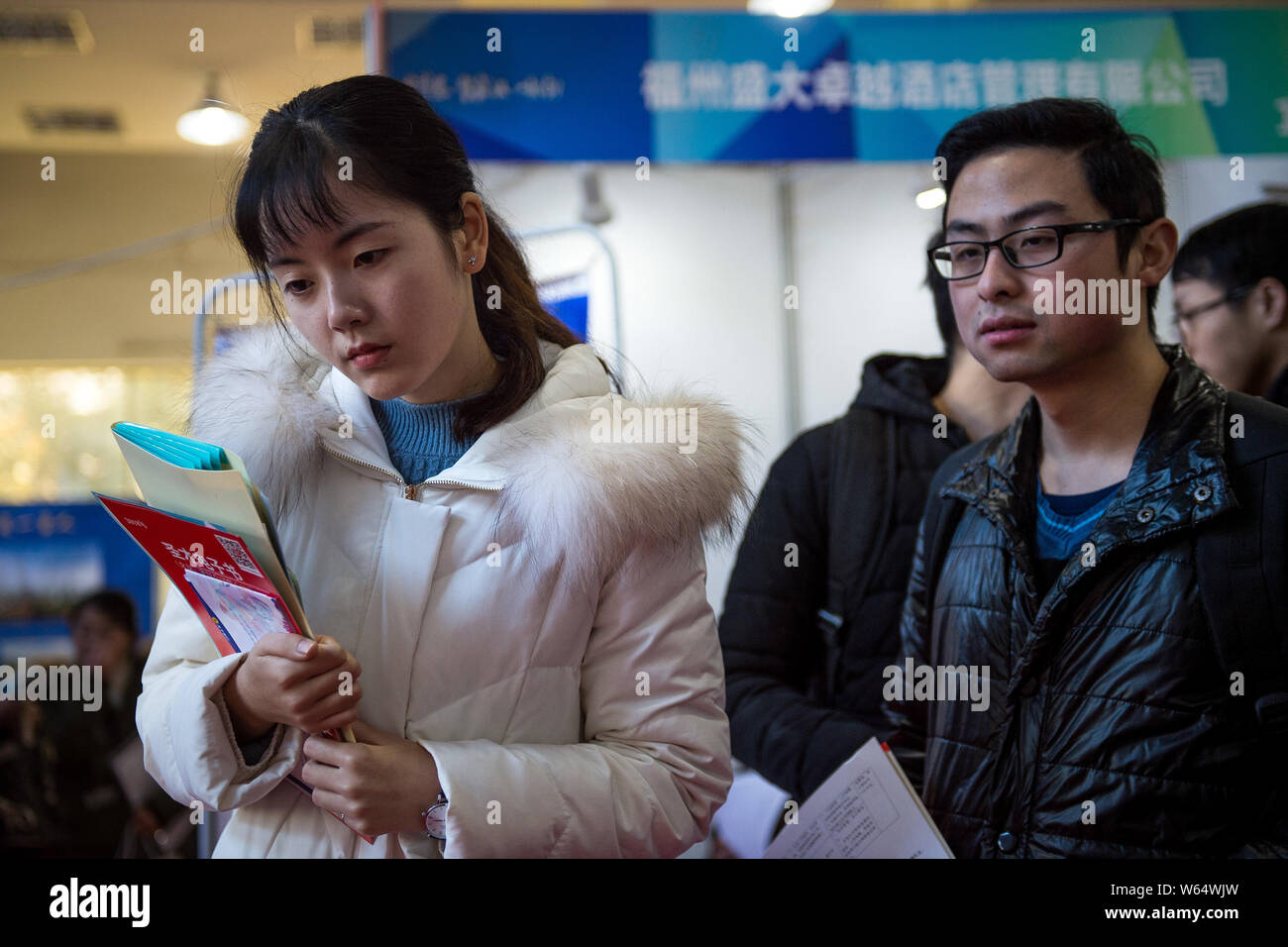 --FILE--Chinese graduates look for employment at a job fair in Wuhan ...