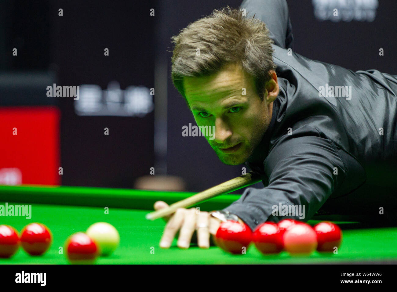 David Gilbert of England plays a shot to Mark Williams of Wales in ...