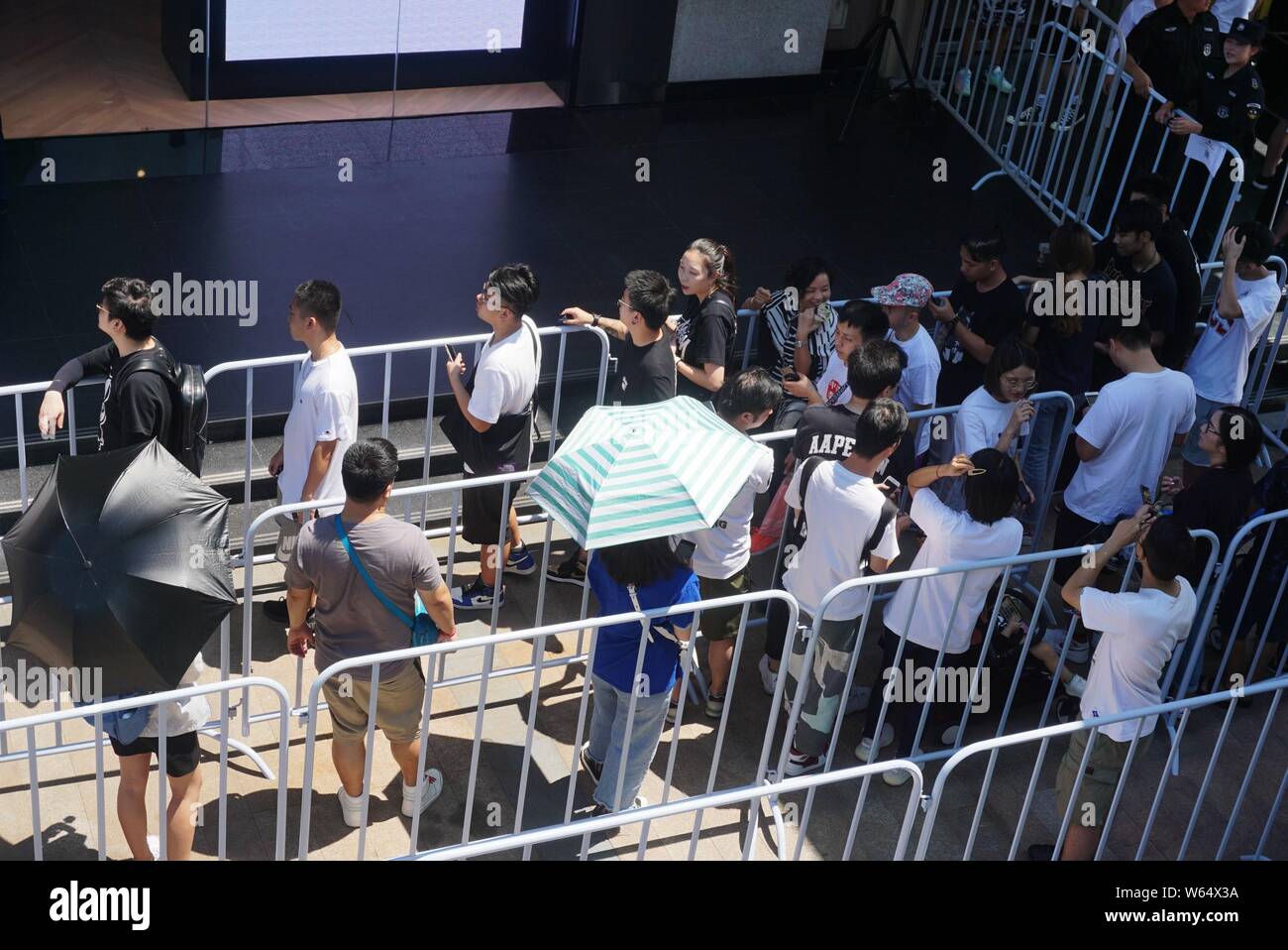 Chinese buyers queue up to buy limited editions of Jordan sneakers in ...