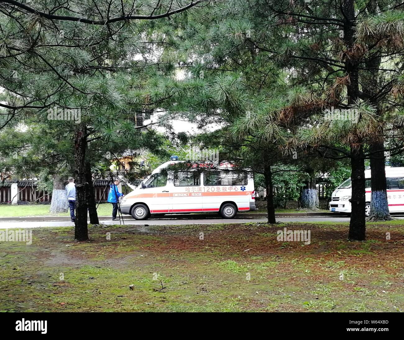 Ambulances standby are parked at the accident site after a spa hotel ...